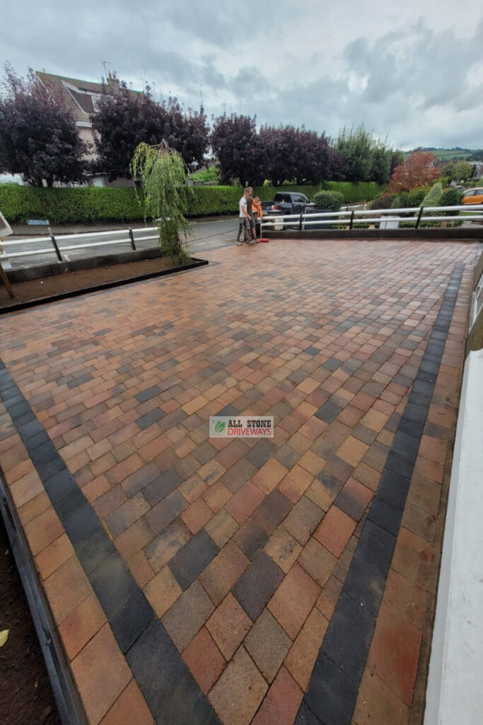 Driveway with Multicoloured Rustic Bricks and Charcoal Brick Border in ...